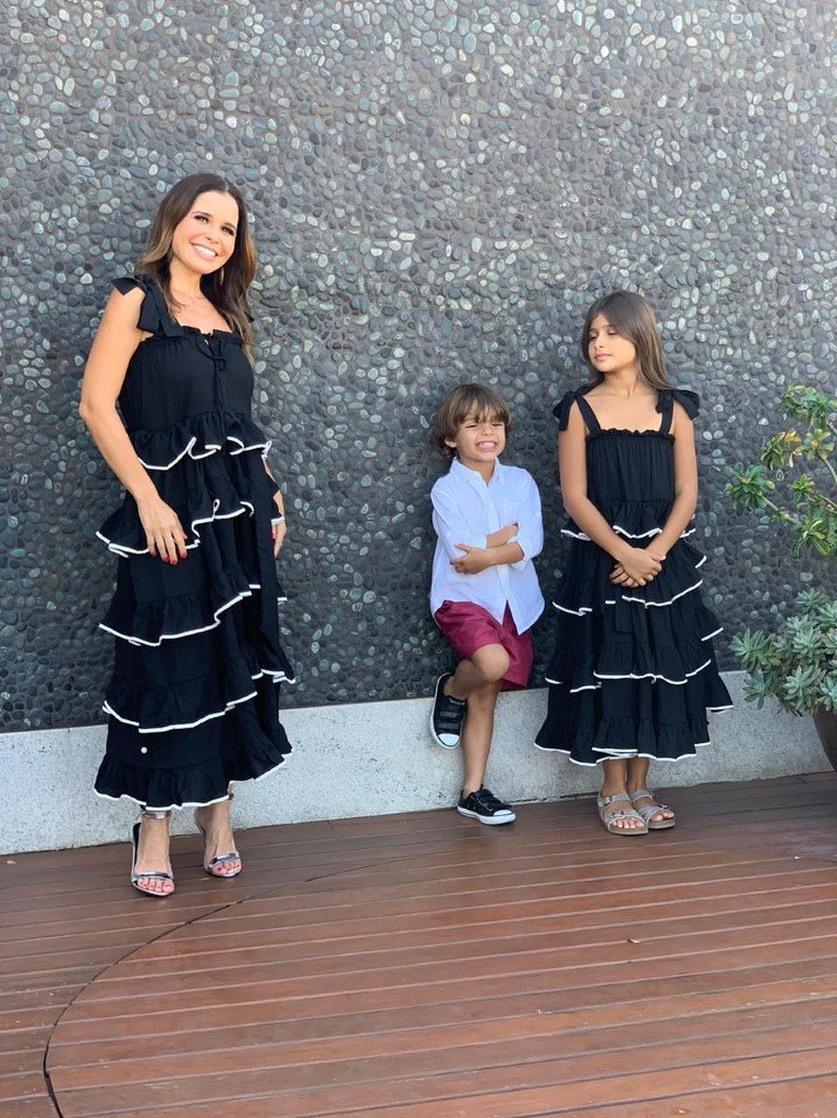 Empresária Andrea Cola ao lado dos herdeiros | Leia